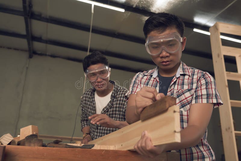 Learning carpentry stock photo. Image of plank, happy - 120529198