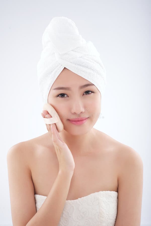 Using powder puff stock photo. Image of charming, portrait - 58098560