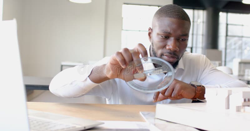 Using Protractor, African American Businessman Measuring and Working on ...