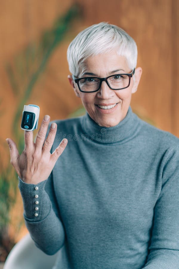 Man Using Pulse Oximeter Measures Oxygen Saturation Level, Health Care ...