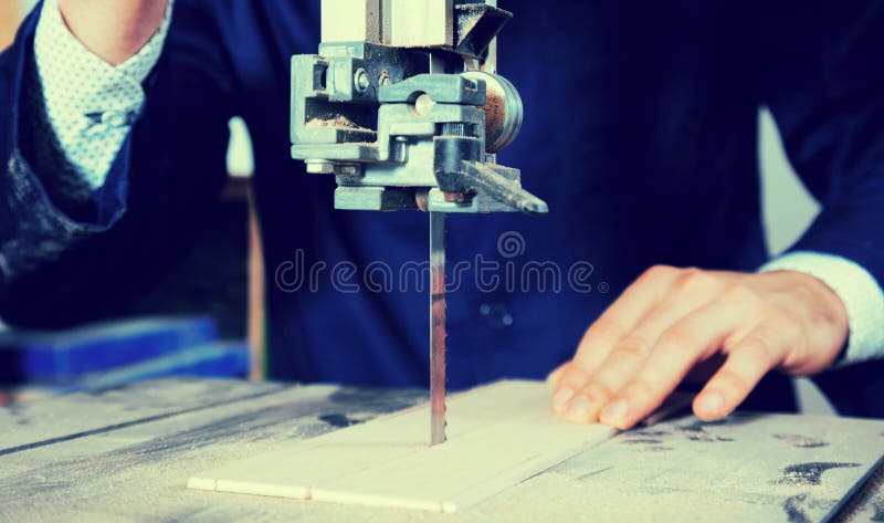 Using ribbon saw stock photo. Image of joiner, cutting - 86795184