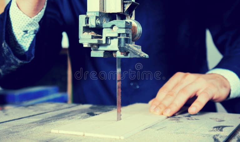 Using ribbon saw stock photo. Image of joiner, cutting - 86795184