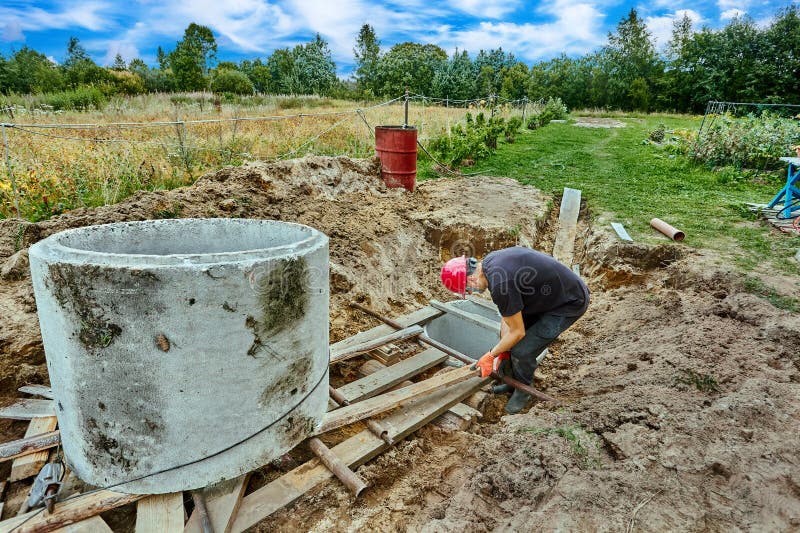 Using Roller Deck To Move Concrete Ring during Installation of Septic ...