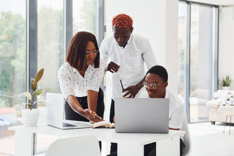 Using Same Laptop for the Project. Group of African American Business ...