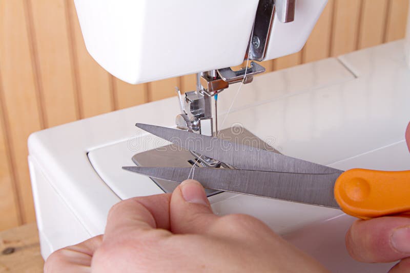 Using Scissors To Cut Thread on Sewing Machine Stock Image - Image of ...