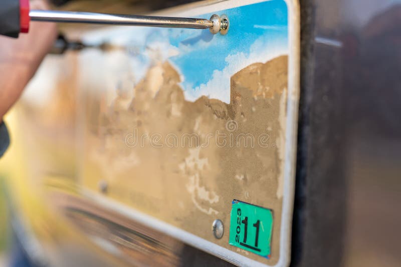 Using a Driver To Remove and Replace a Vehicle Rear License Plate ...