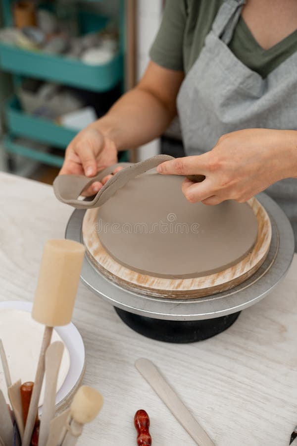 Using a Sharp Pottery Carving Knife To Cut Out a Perfect Round Shape ...