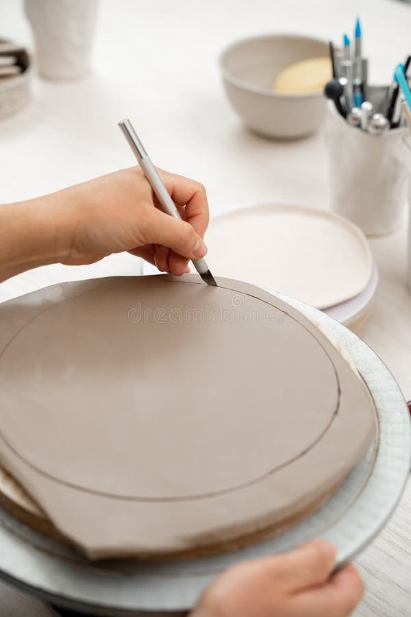 Using a Sharp Pottery Carving Knife To Cut Out a Perfect Round Shape ...