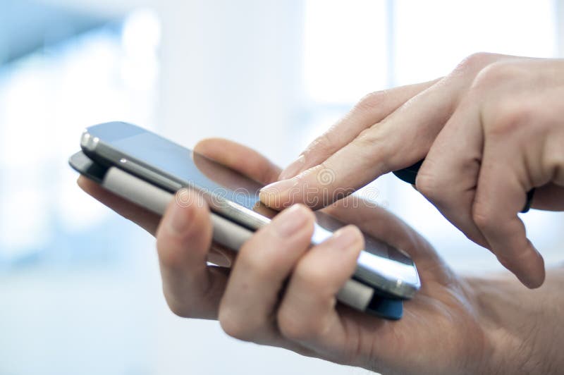 Using smart-phone stock photo. Image of close, messaging - 44318732