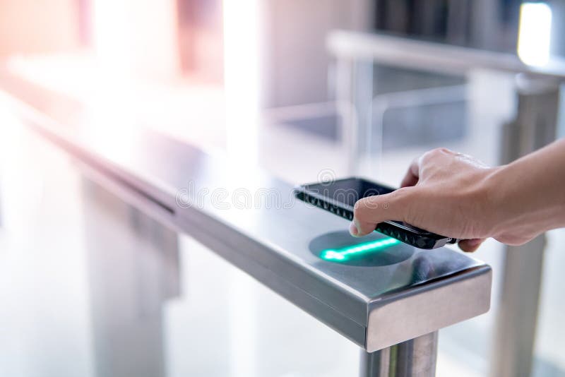 Using Smartphone To Open Automatic Gate Machine Stock Photo - Image of ...