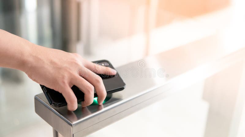 Using Smartphone To Open Automatic Gate Machine Stock Photo - Image of ...