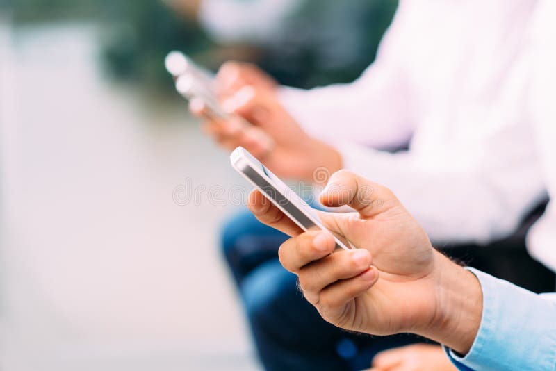 Using smartphones stock photo. Image of technology, caucasian - 53827246