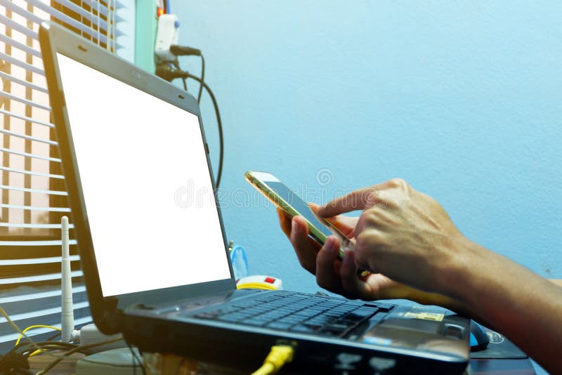 Using Smartphones with a Notebook Computer To Work Together Stock Photo ...