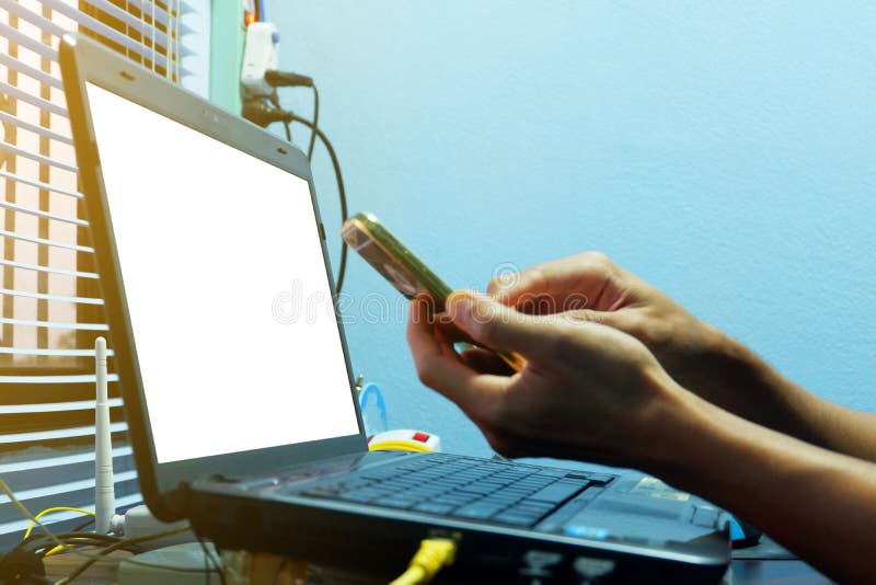 Using Smartphones with a Notebook Computer To Work Together Stock Photo ...