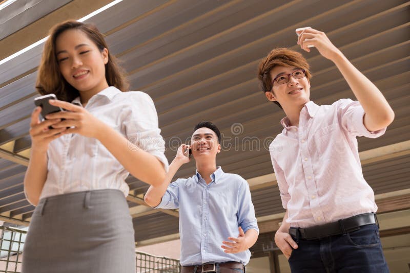 Using smartphones stock image. Image of asian, business - 48393153