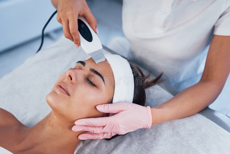 Using Special Device. Close Up View of Woman that Lying Down in Spa ...