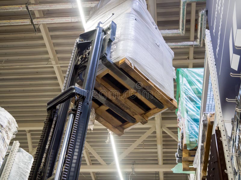 Using a Stacker To Stack Goods Editorial Photography - Image of working ...