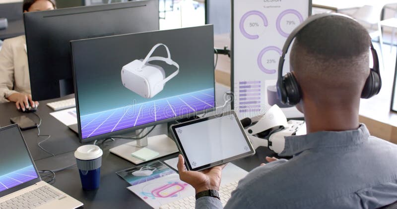 Using Tablet and VR Headset, African American Man Working on Virtual ...