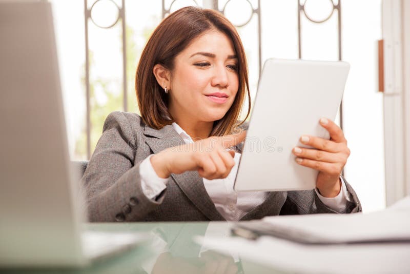 Using a tablet at work stock photo. Image of girl, office - 49731234