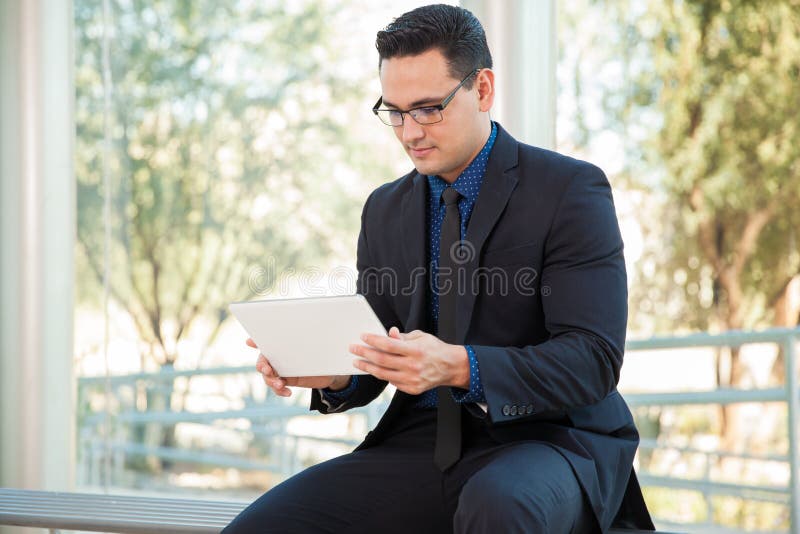 Using a tablet at work stock image. Image of sitting - 47882067