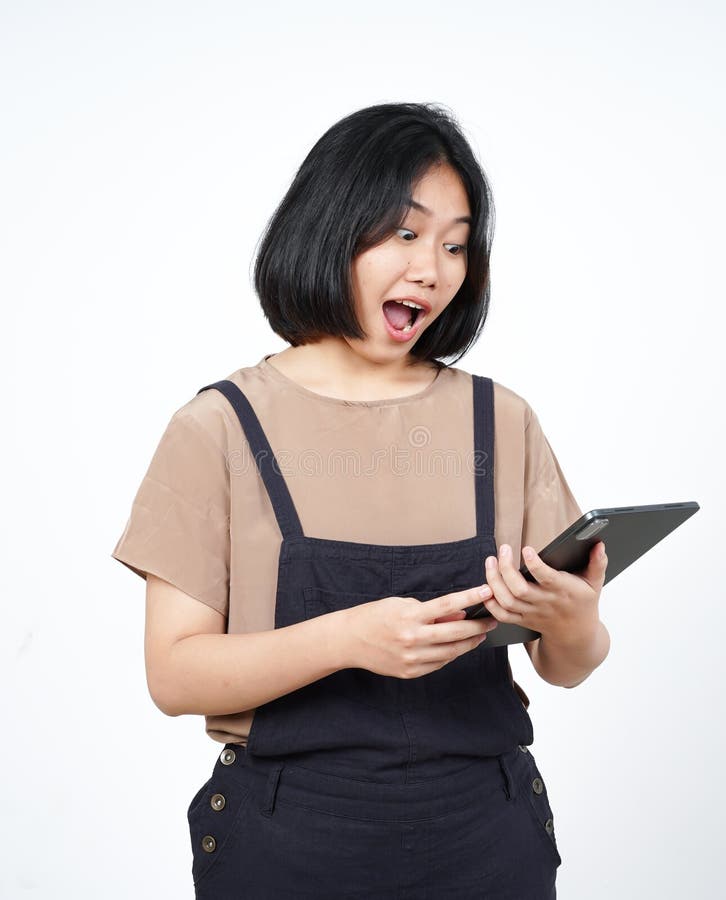 Using Tablet with Wow Face Expression of Beautiful Asian Woman Isolated ...