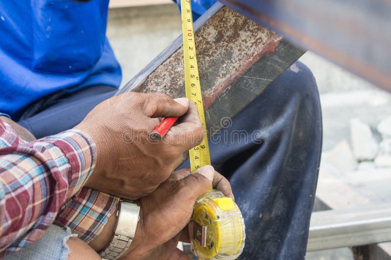 Using Tape Measure for Measuring Size of Stair Stock Photo - Image of ...