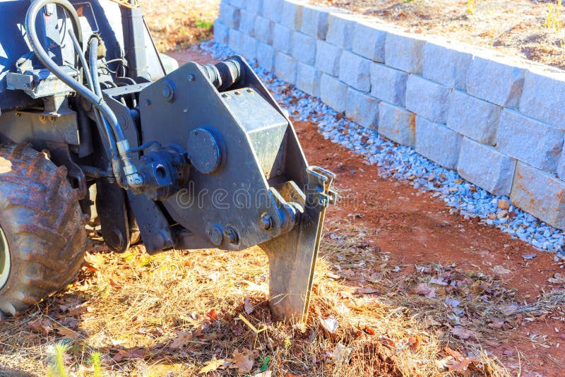 Using a Trencher Cable Plow Tractor To Lay Fiber Optic Cables Stock ...