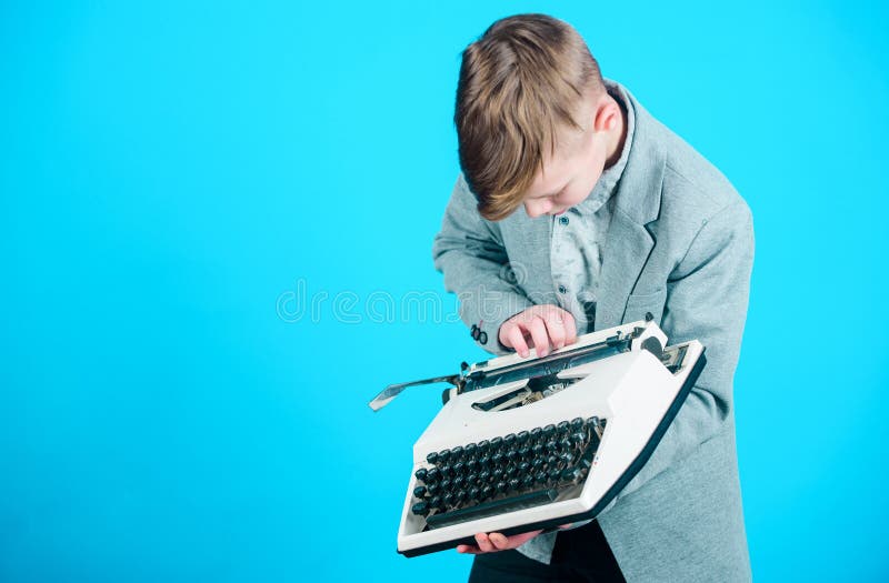 Using a Typing Machine. Small Kid Typewriting on Old Typewriter. Smart ...