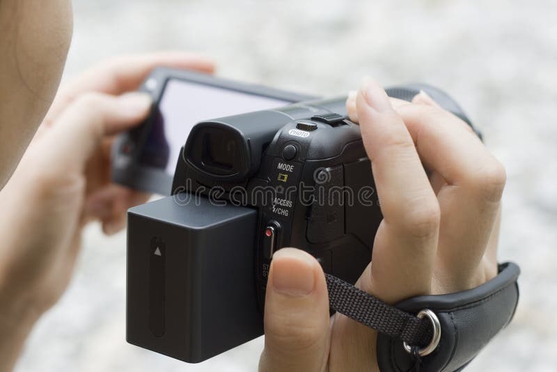 Using a video camera stock photo. Image of film, shoot - 10840490
