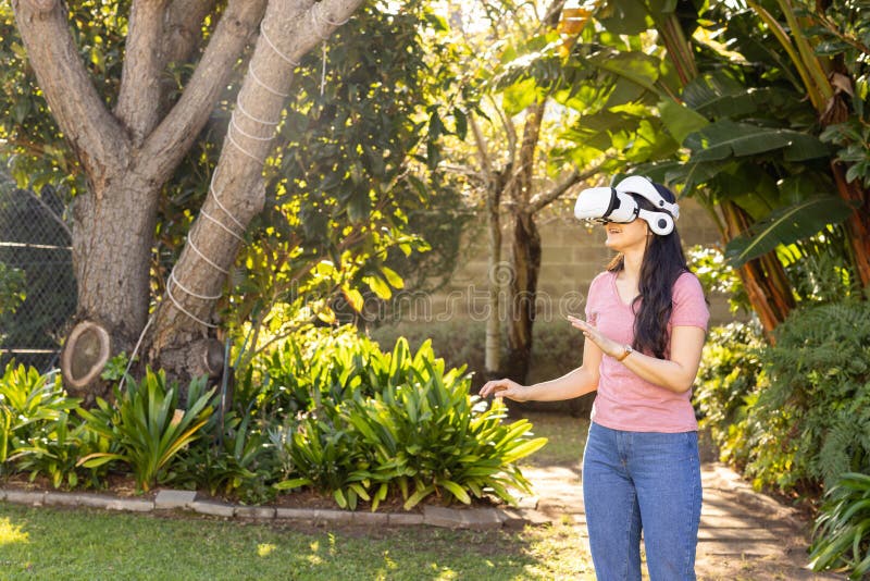 Using VR Headset, Asian Woman Exploring Virtual Reality in Outdoor ...