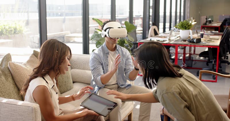 Using VR Headset, Man Discussing Interior Design with Multiracial ...