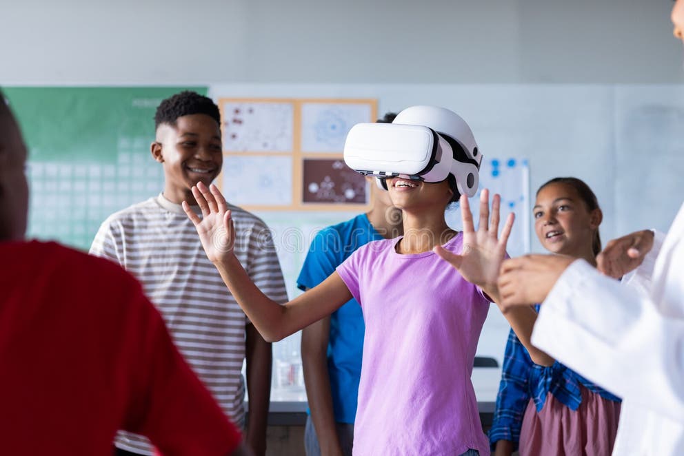 Using VR Headset, Students in School Classroom Exploring Virtual ...