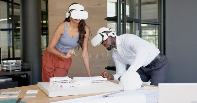 Using VR Headsets, Diverse Colleagues Collaborating on Architectural ...