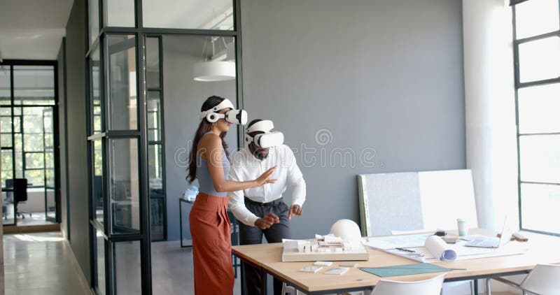 Using VR Headsets, Diverse Colleagues Collaborating on Architectural ...