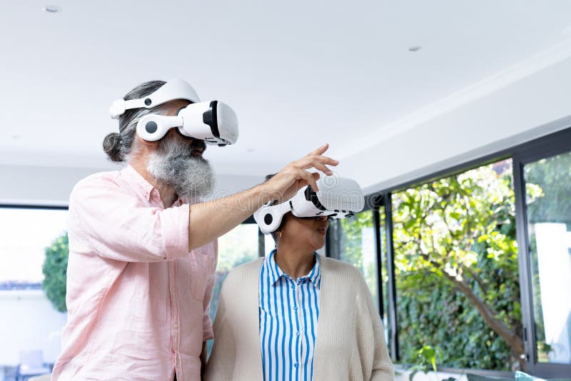 Using VR Headsets, Senior Couple Exploring Virtual Reality Experience ...