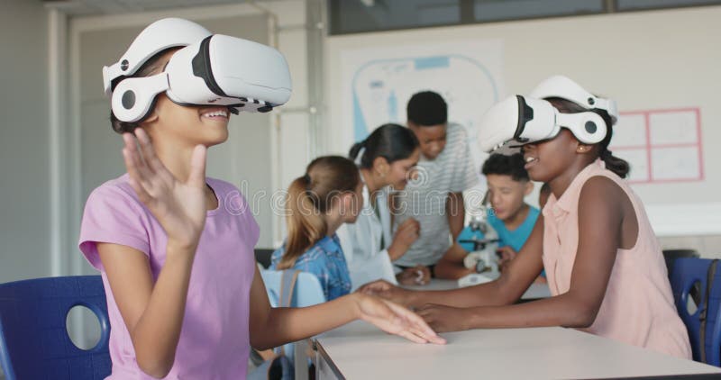 Using VR Headsets, Students Exploring Virtual Reality in School ...