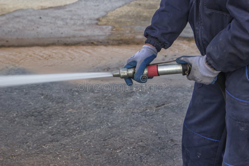 Using Water Hose To Clean Road 2 Stock Photos - Free & Royalty-Free ...