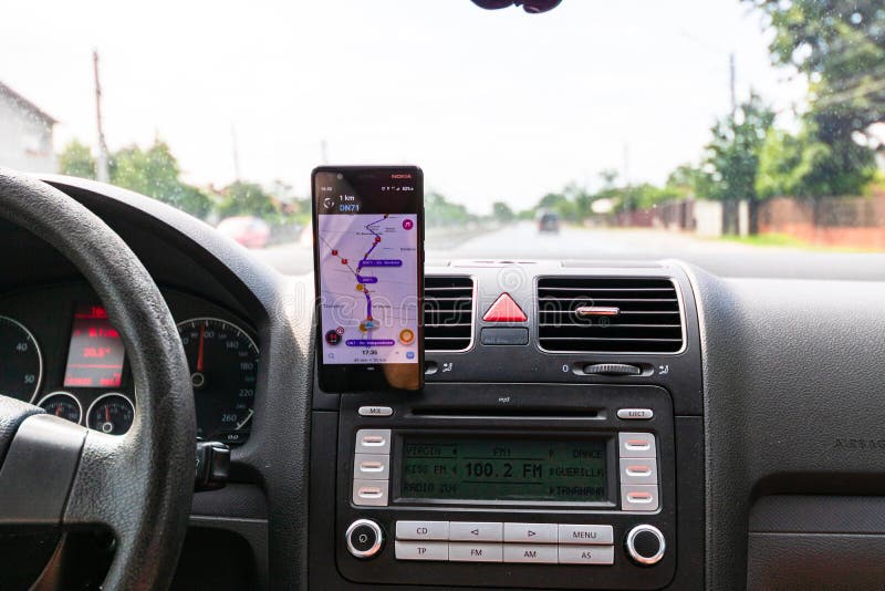 Using Waze Maps Application on Smartphone on Car Dashboard, Bucharest, Romania, 2022 Editorial ...
