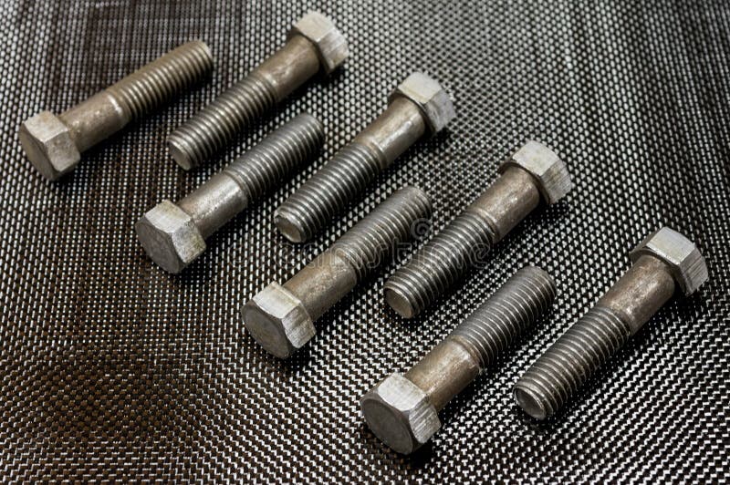 USS Shanked Bolts on Carbon Fiber Stock Photo - Image of hardware, bolt ...