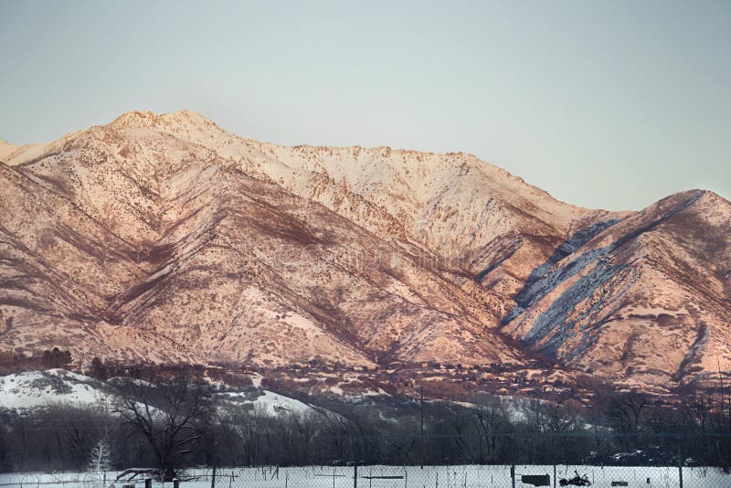 Utah Snow Capped Mountains with Sun Setting Stock Image - Image of ...