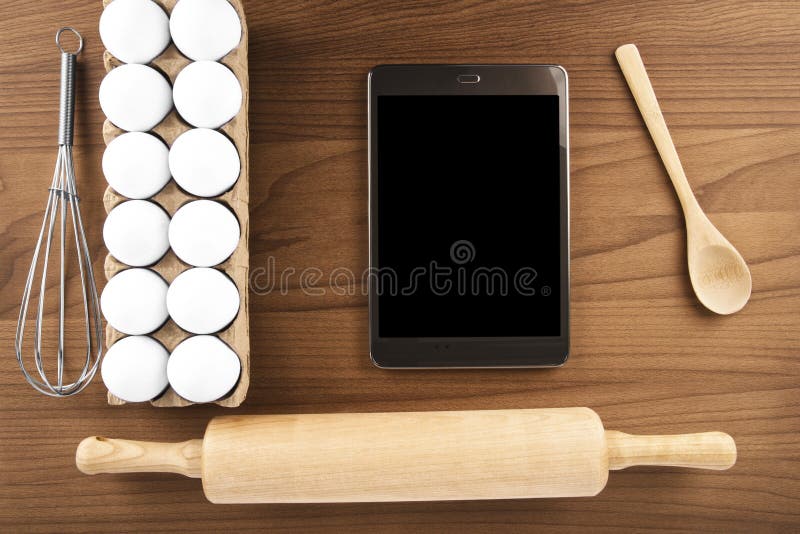 Utensils and Ingredients All Around a Digital Tablet Stock Image ...