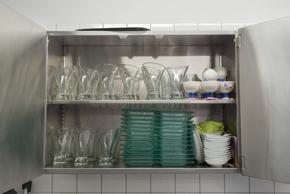 Utensils in the Kitchen Cupboard Stock Photo - Image of crockery, glass ...
