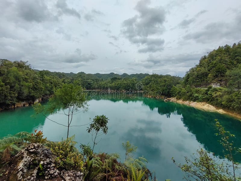 Uter Lake Aitinyo, West Papua Stock Photo - Image of aitinyo, blue ...