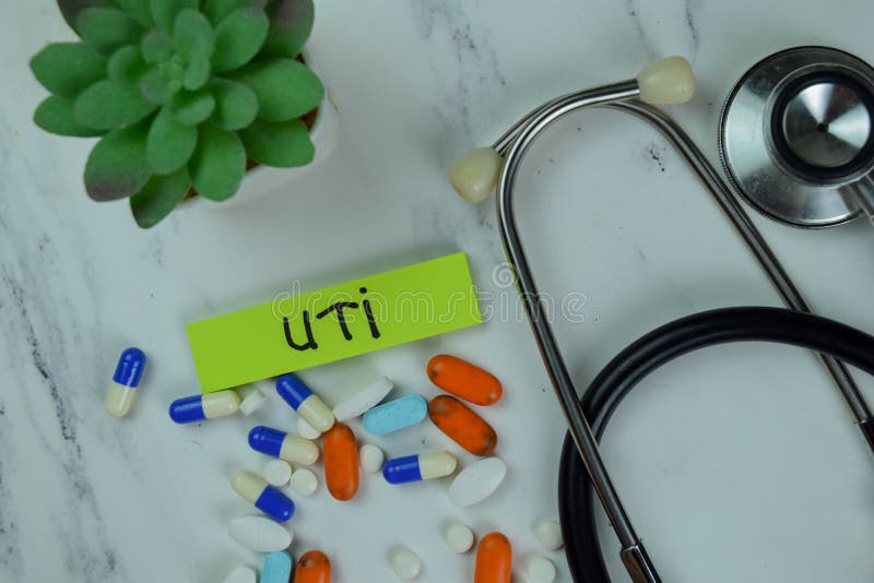 UTI Write on Sticky Notes Isolated on Wooden Table Stock Photo - Image ...