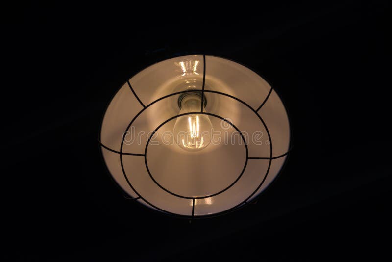 Utilitarian Overhead Lamp Featuring the Glowing Elements of a Clear ...