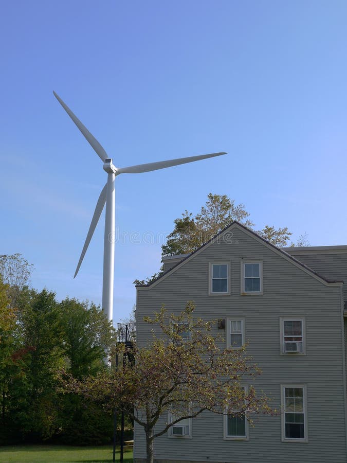 Utilities: Wind Turbine with Apartment Building Stock Photo - Image of ...