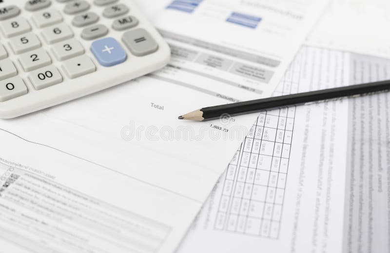Utility Bill and Calculator with Pencil Stock Photo - Image of cost ...
