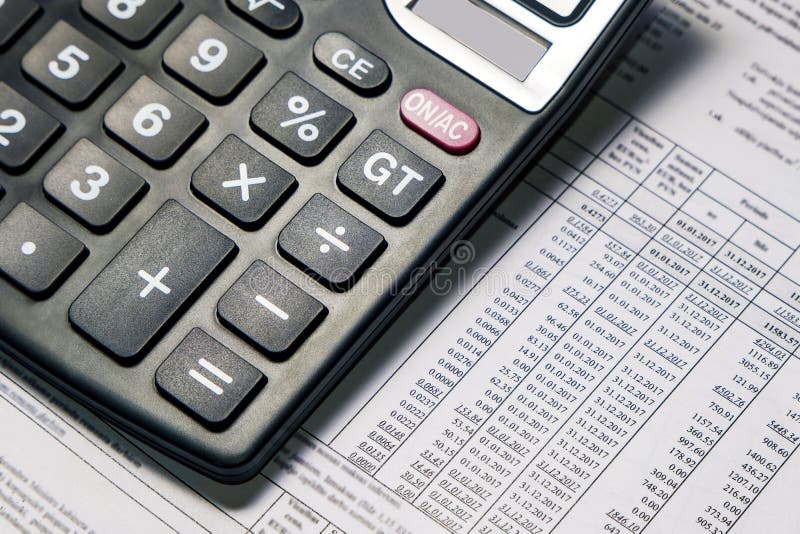 Utility Bill and Calculator on the Table. Analysis of Financial Data ...