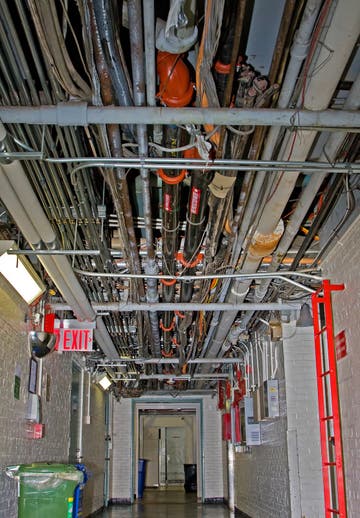 Utility cables and pipes stock photo. Image of indoor - 4855382