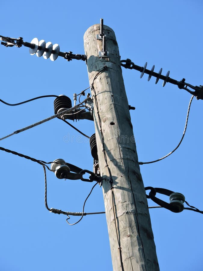 Utility Electrical and Telephone Pole Against Blue Sky Stock Image ...